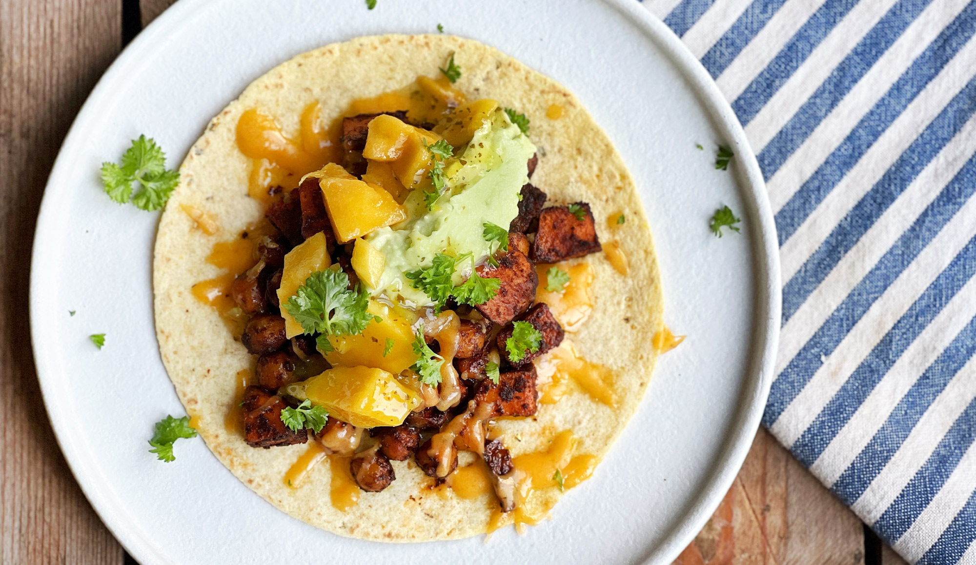 Soft Taco's met zoete aardappel, mango, guacamole en cheddar